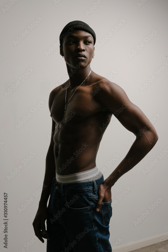 Studio portrait of muscular male model posing shirtless Stock Photo ...