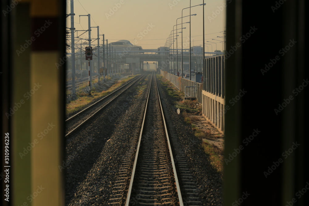 railway tracks. one point perspective view of a strait long train rail ...