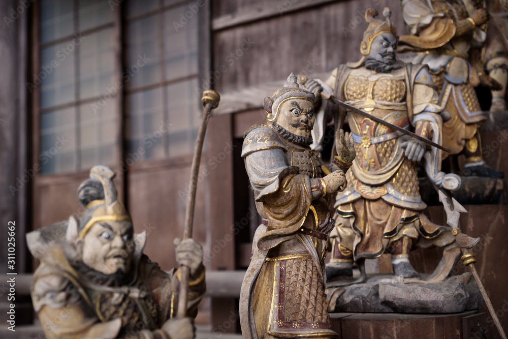 Fudo statues at the entrance of a Daishoin shrine, Miyashima, Japan ...