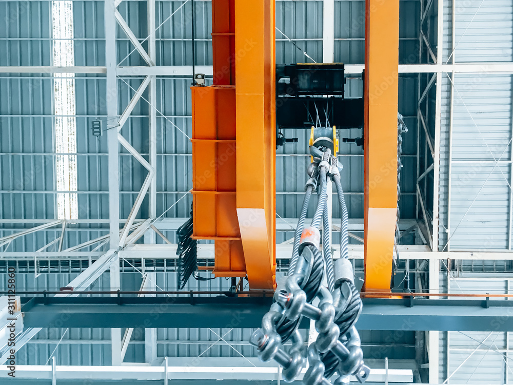 Overhead crane and machine inside factory building, industrial ...