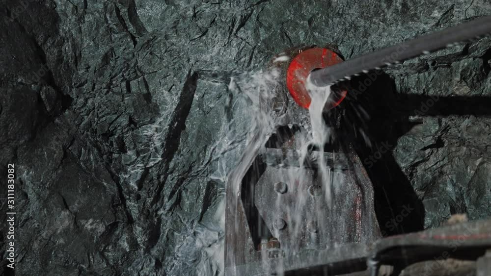 Rock surface drilling machine used to drill blast holes at mine tunnel ...