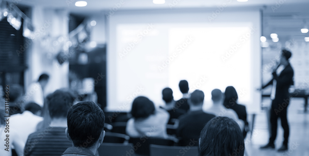 Business presentation being given by tech executive. Corporate seminar ...