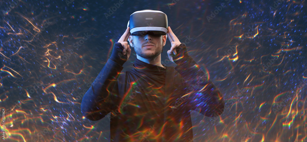 Young man on virtual reality background. Guy using VR helmet. Augmented ...