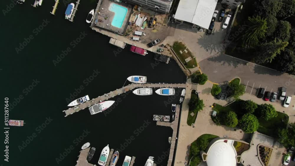 Round Lake in Charlevoix connects to Lake Michigan with boats and sail ...
