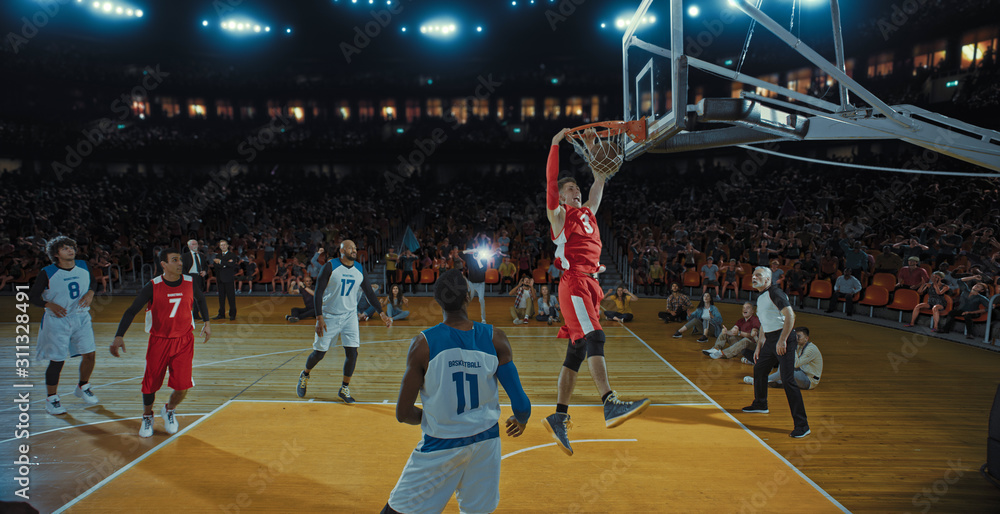 Basketball players on big professional arena during the game. Tense ...