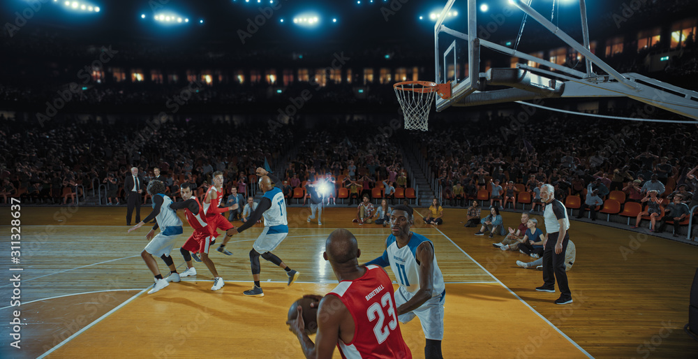 Basketball players on big professional arena during the game. Tense ...