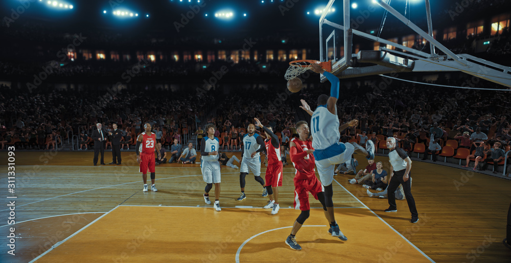 Basketball players on big professional arena during the game. Tense ...