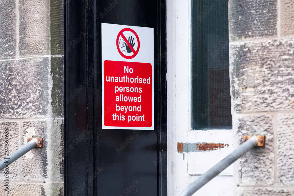 Building entrance private no unauthorised persons allowed beyond this ...