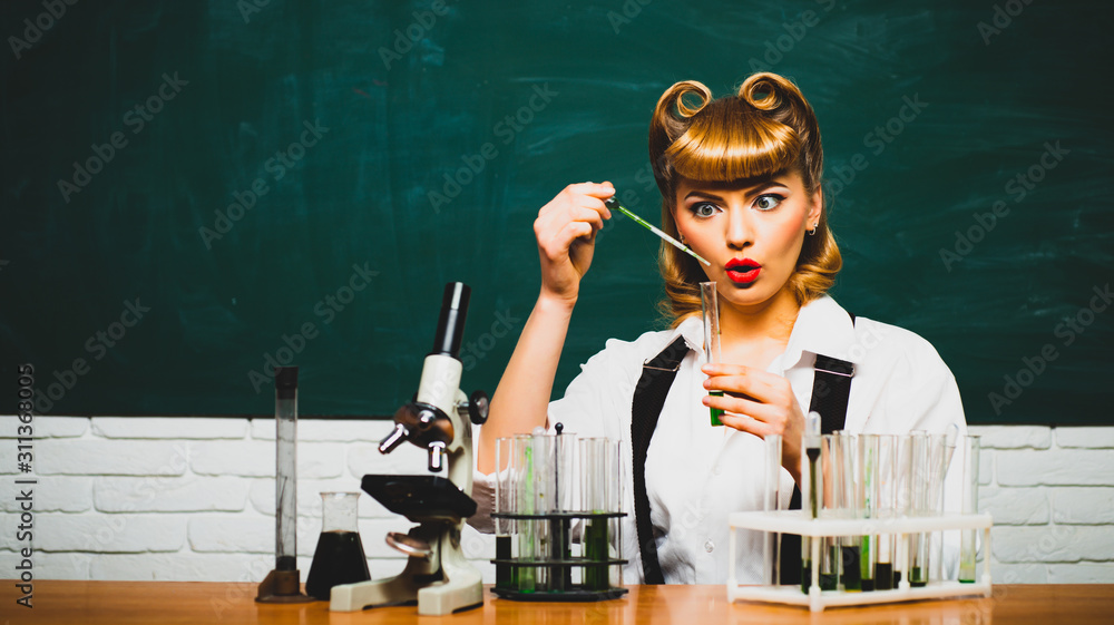 Beautiful scientist woman. New discovery. Chemistry and experiments ...