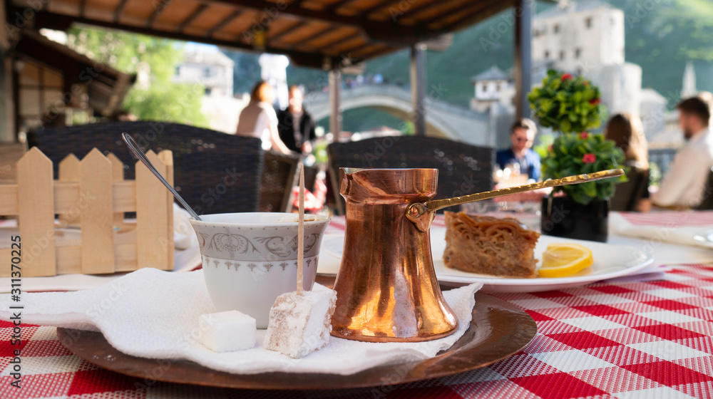 Traditional Bosnian coffee on the table with the view of Mostar Old ...
