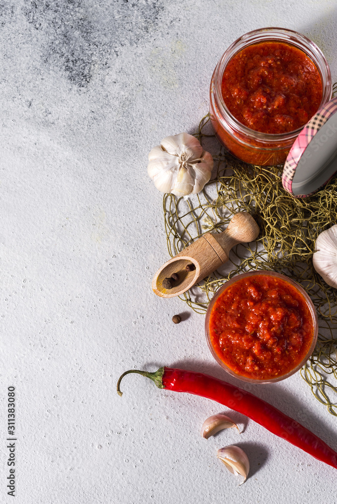 Traditional mexican, georgian and arabic harissa pepper paste on a ...