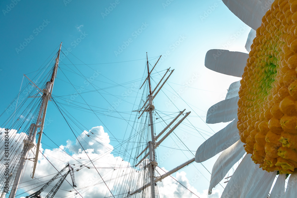 The modern monument of Daisy on the embankment of the Aura River and ...