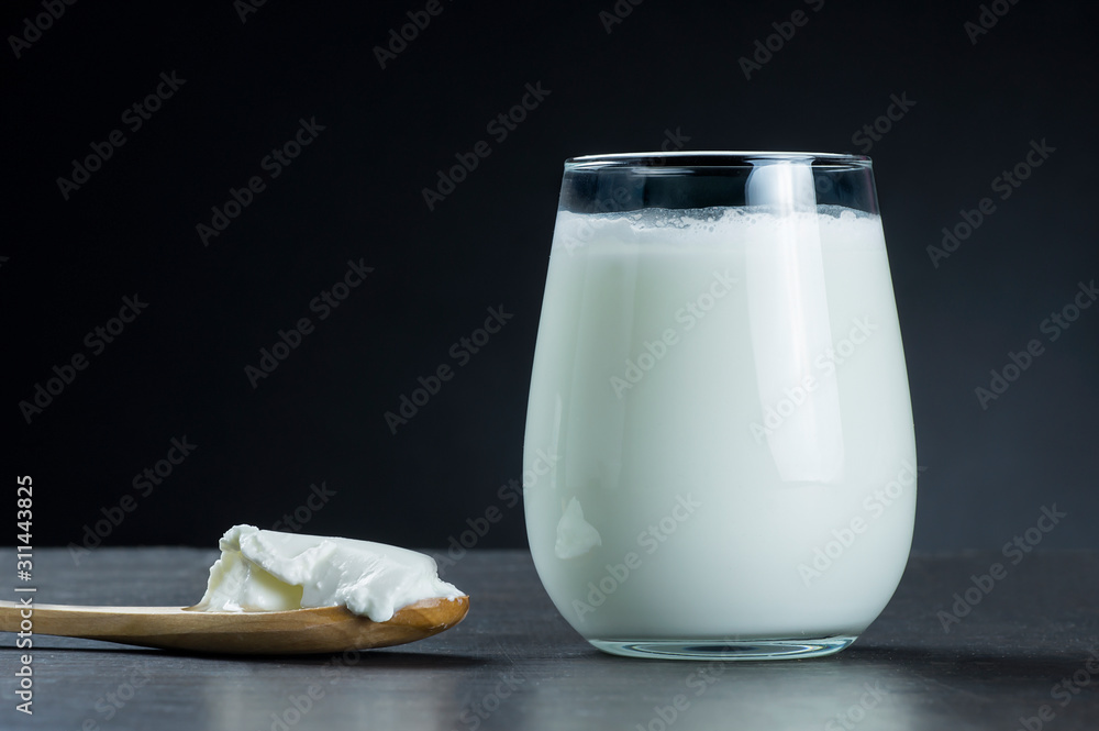 Glass cup of Turkish traditional drink ayran , kefir or buttermilk made ...