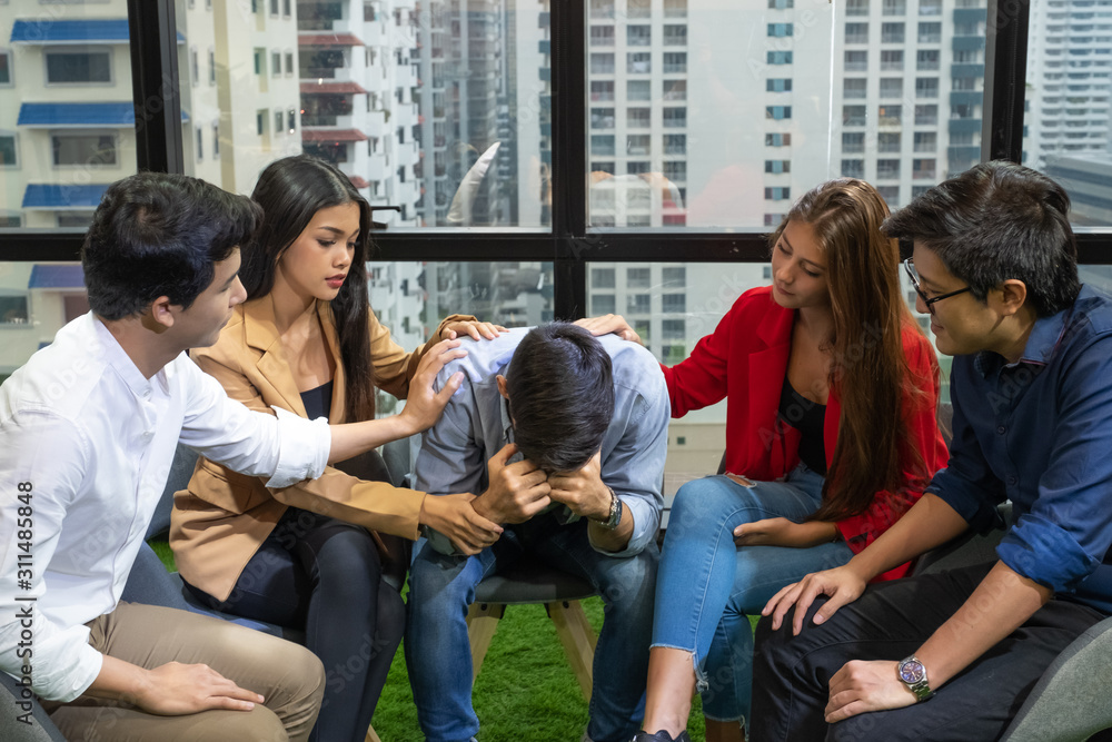 Group of various nationalities friends or colleagues cheering up and ...