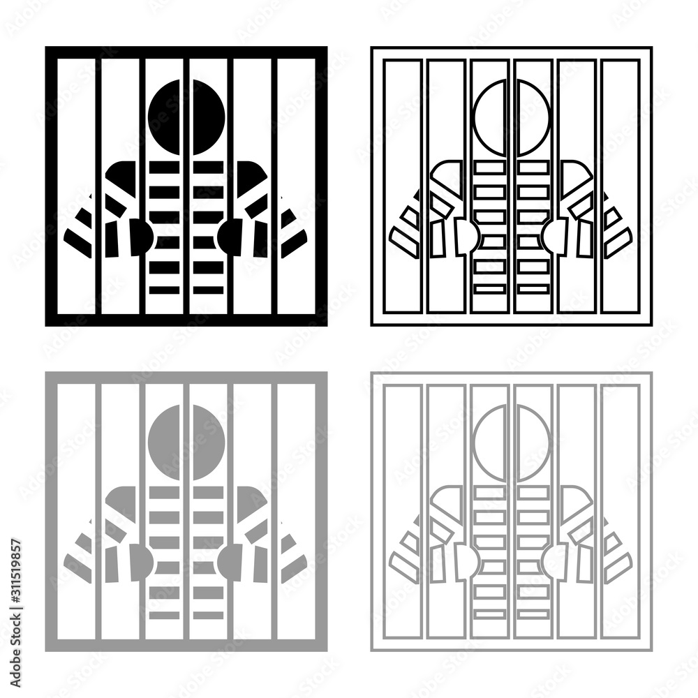 Prisoner behind bars holds rods with his hands Angry man watch through ...