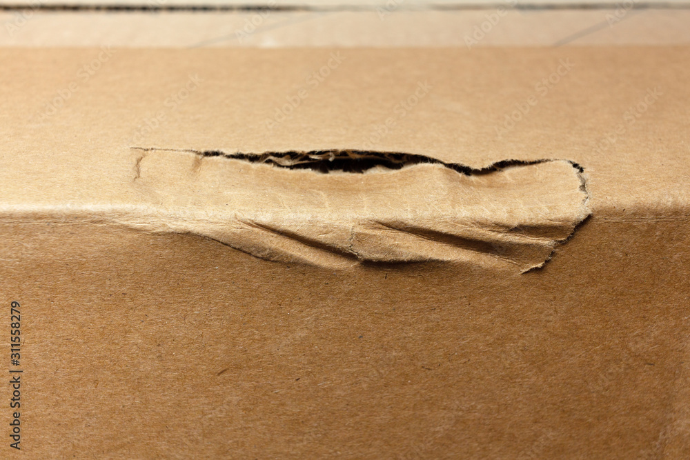damaged cardboard box Stock Photo | Adobe Stock