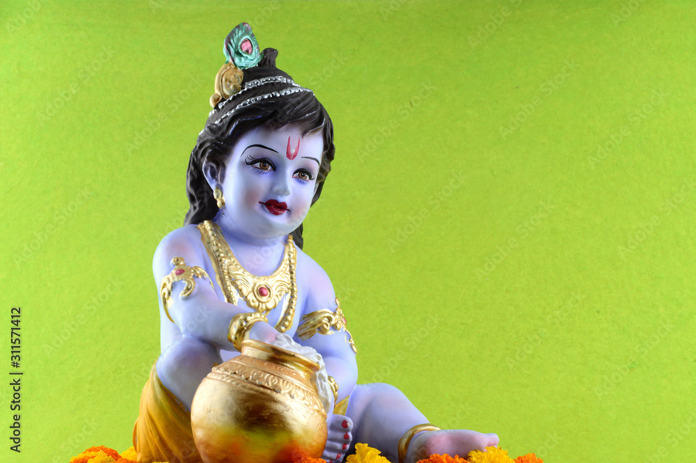 Hindu God Krishna on green background Stock Photo | Adobe Stock