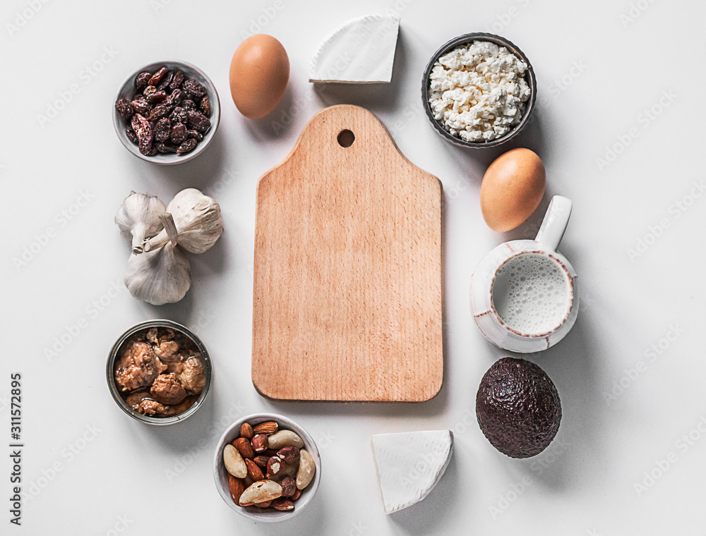 Set of foods that are rich in calcium on a white background. Food is a ...