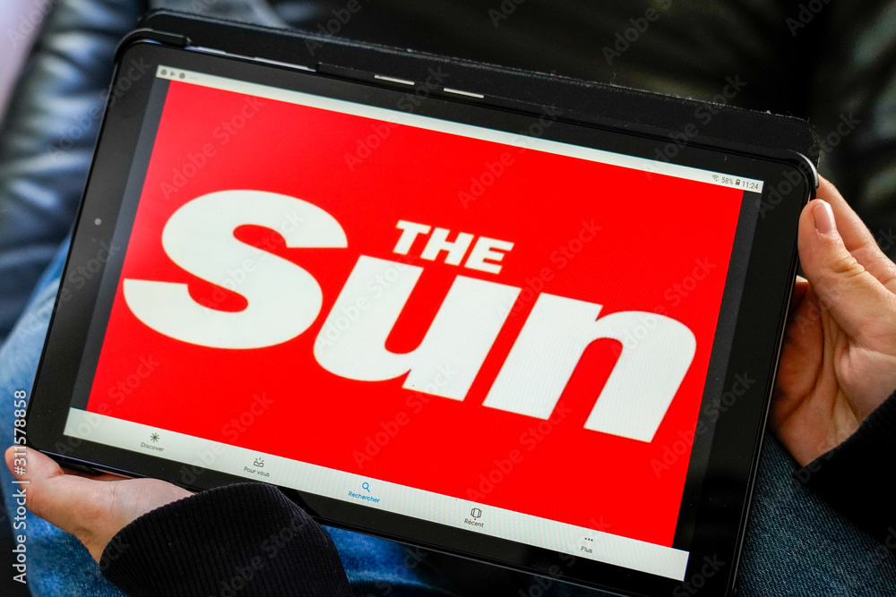 Britain The Sun tabloid british best-selling newspaper in screen tablet ...