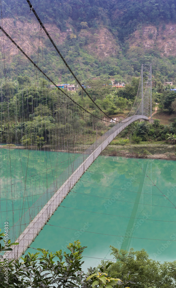 Suspension bridge over the Trishuli river in Nepal, Nepal Stock Photo ...