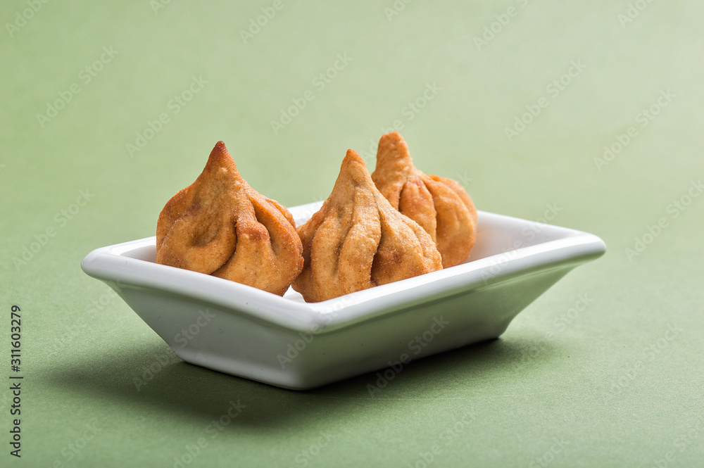Indian Food: Modak on green background, Maharashtra Sweet Dish ...