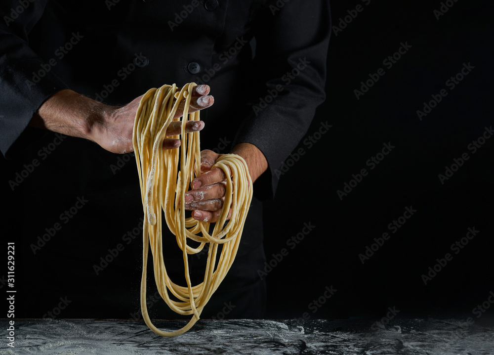 Chef Makes Noodles by Hand. Hand Pulled Noodles Stock Photo | Adobe Stock