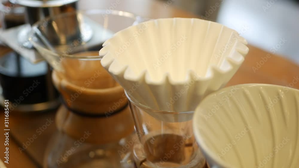 Close-up of different stuff for preparation of delicious coffee in cafe ...