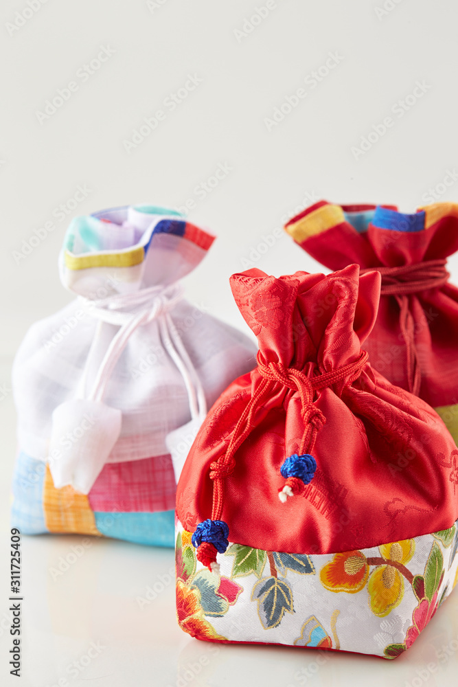 Korean traditional pouch bag on white background Stock Photo | Adobe Stock