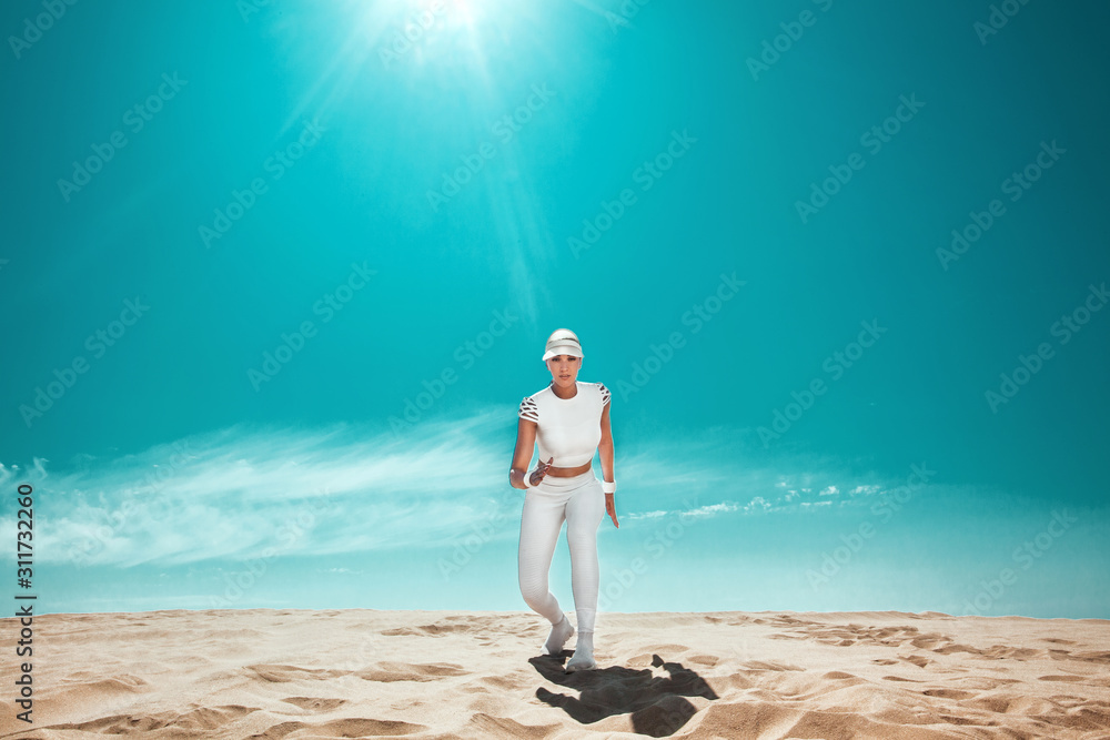 Athlete runner. Sporty and fit woman running on the sky background. The ...