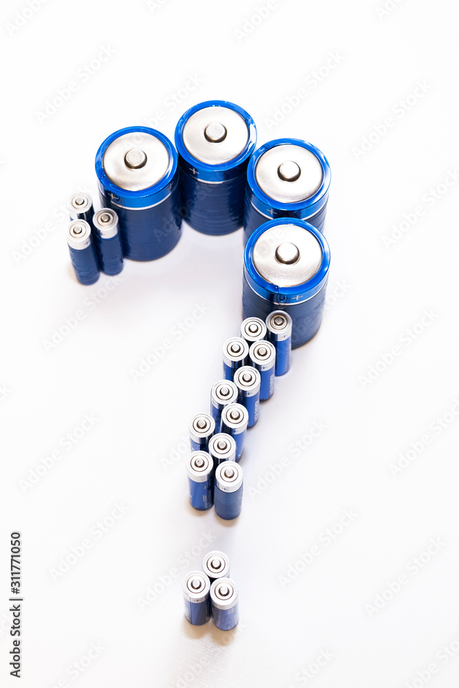 Question mark made of rechargeable batteries. Question mark on a white ...