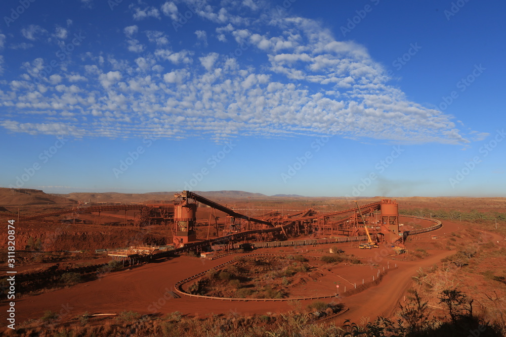 Beautiful morning sun over mining pit operation Pilbara region with ...