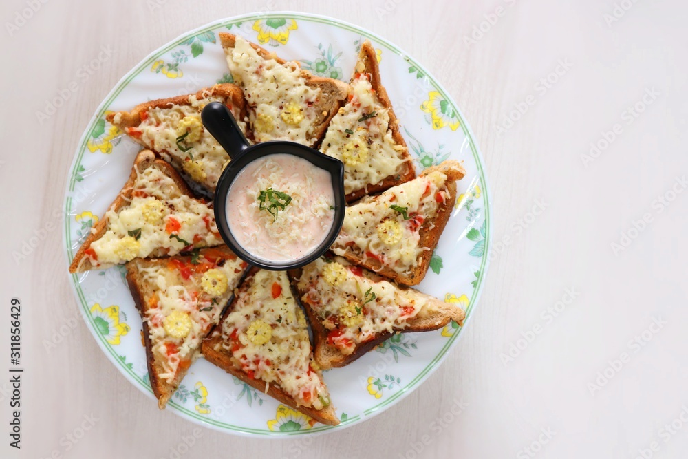 Chili Cheese toast, Open cheese sandwich or mini bread pizzas served ...