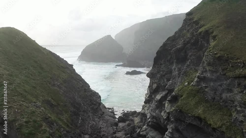 Vidéo Stock Cornwall coast in England - Soil erosion caused by the ...