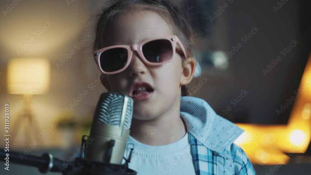 Little Girl Child Singing Song Into Microphone At Home Stock Video ...