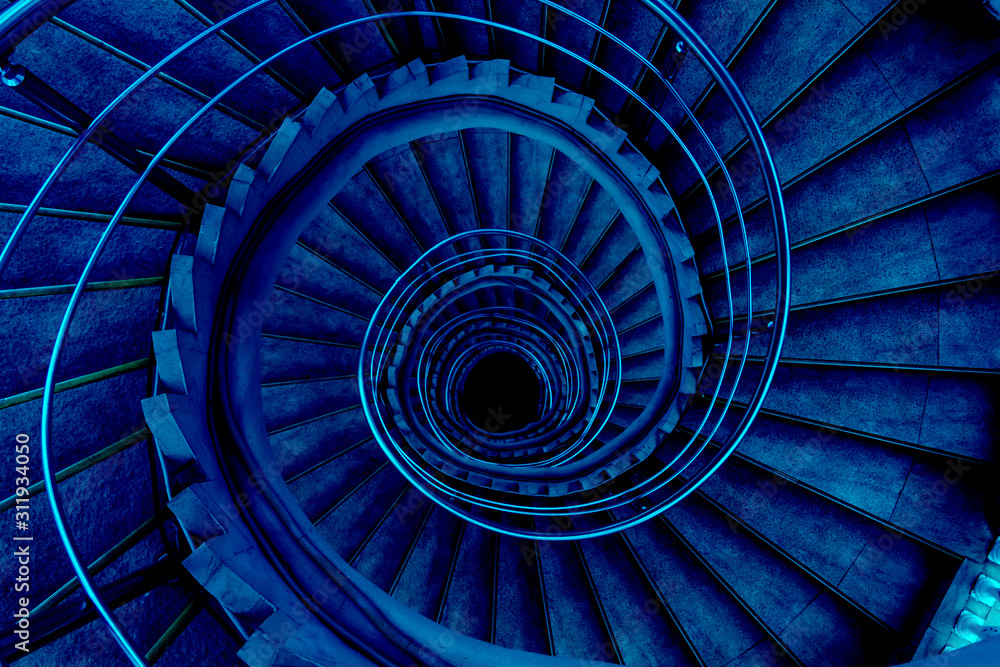 Spiral staircase goes in the centre, looks like a snail. Toned in ...