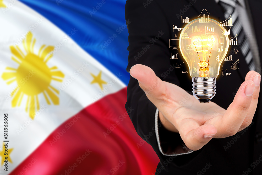Philippines creativity concept. Businessman with a light bulb in his ...