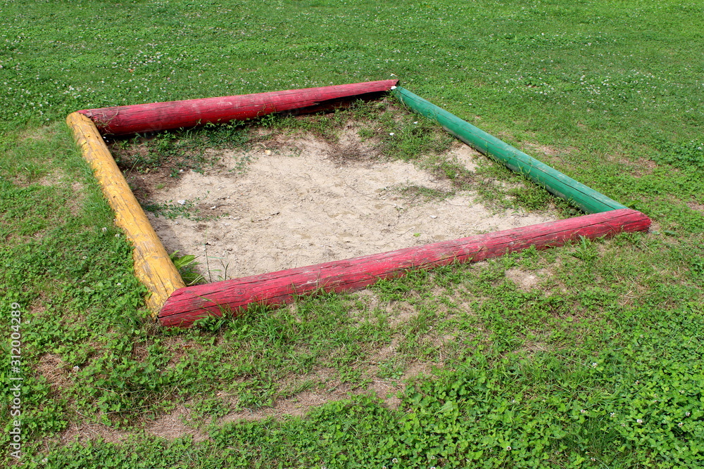 Improvised vintage retro colorful wooden sandbox made from four wooden ...