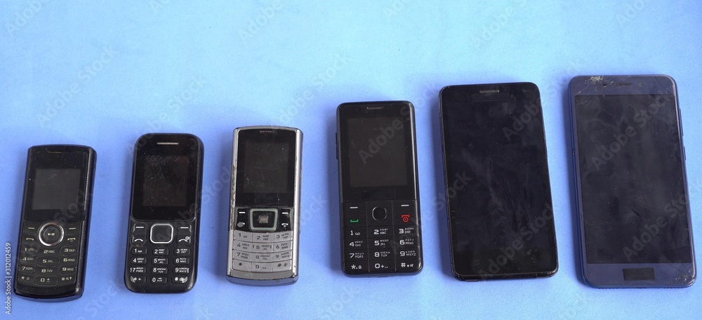 Scrapped old broken obsolete non-working mobile phones. Hazardous E ...