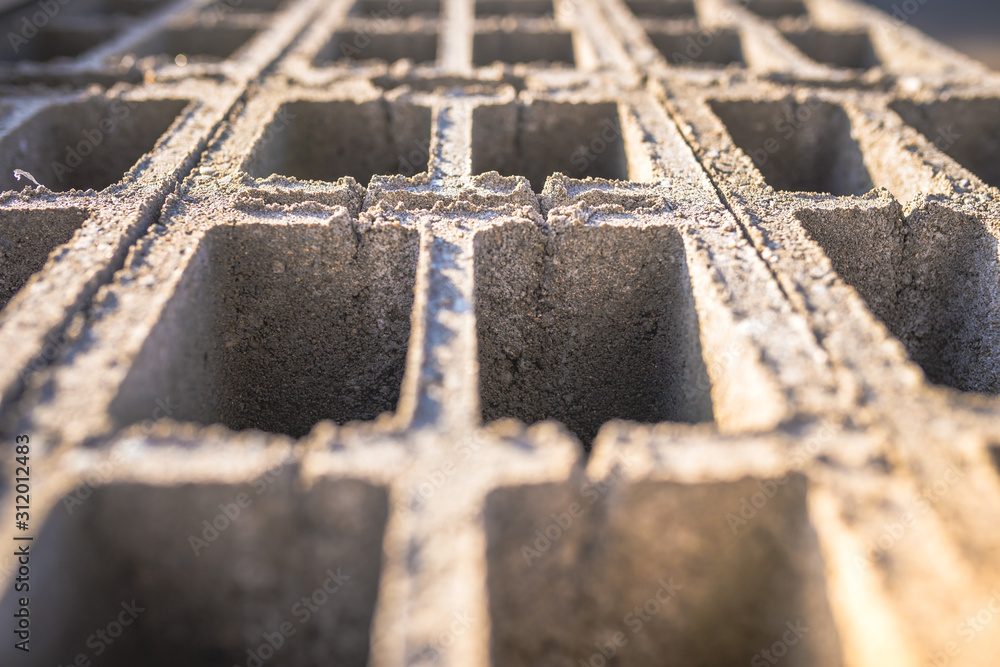 Concrete block bricks in stack for wall construction. Concrete block ...