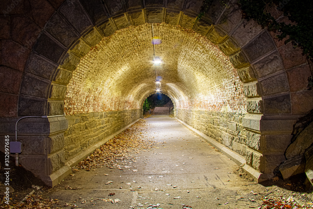 Nighttime image looking through Inscope Arch in New York City’s Central ...