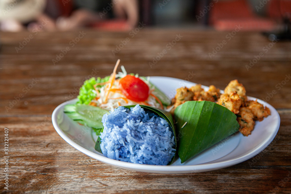 Butterfly-pea flower blue rice on a plate in Chiang Mai, Thailand Stock ...