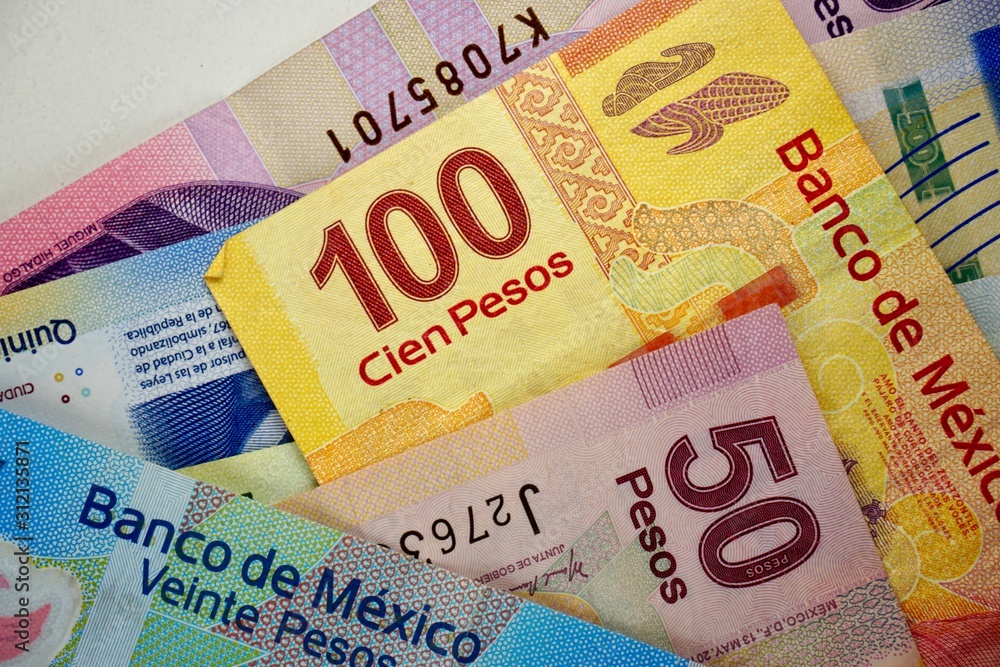 Mexican pesos bills spread randomly over a flat surface Stock Photo ...