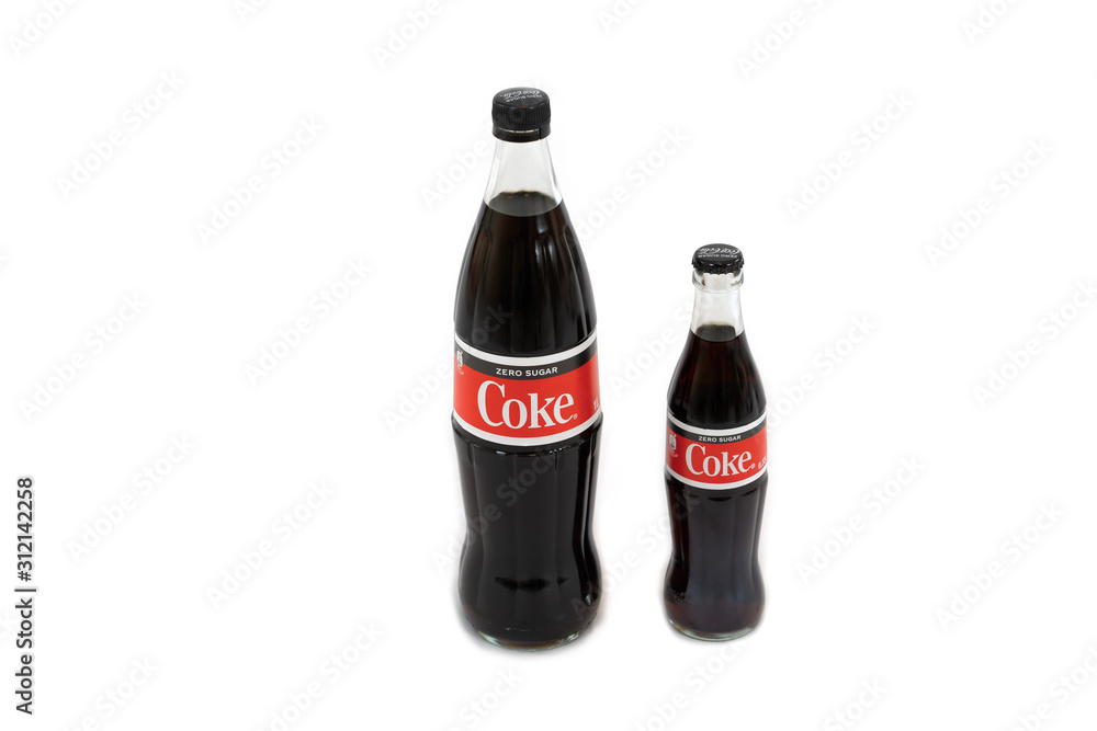 berlin germany, december 2020: coca cola - two bottles of glass, half ...