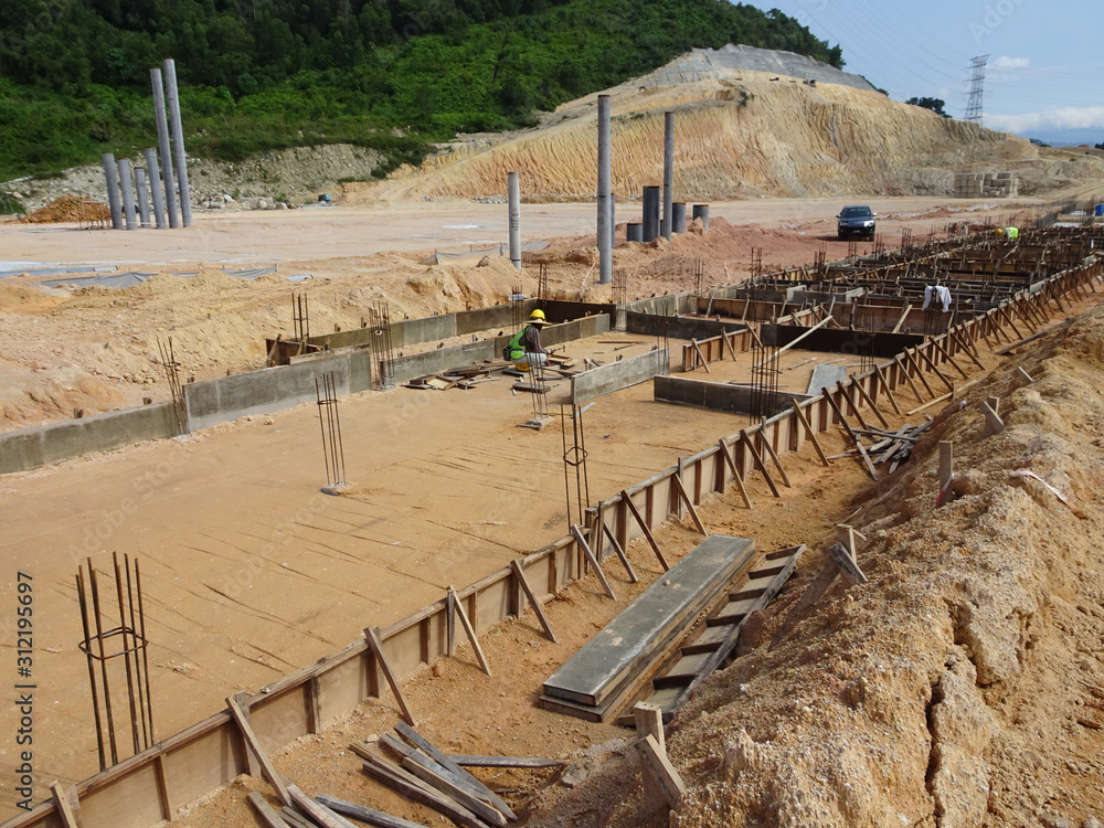 Building ground beam under construction using temporary timber plywood ...
