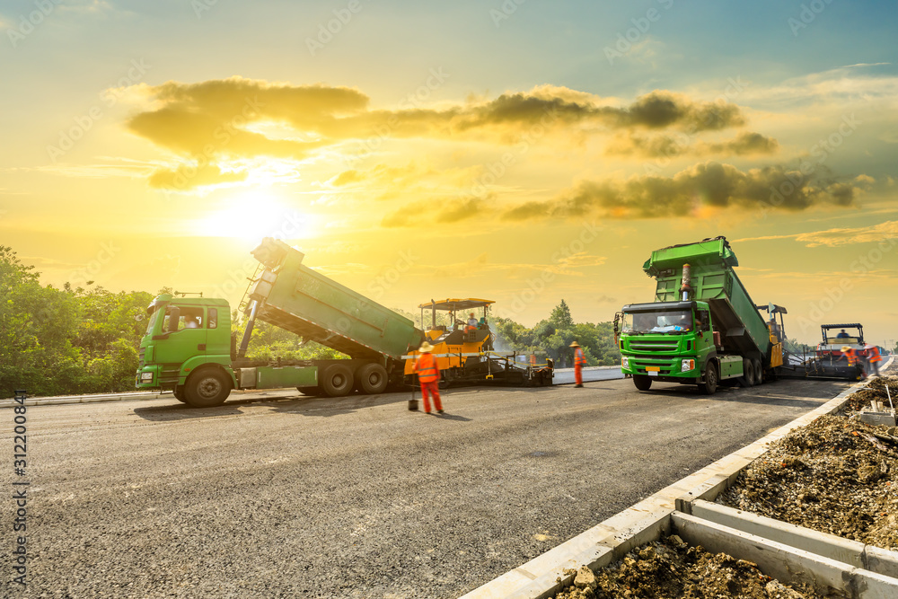 Construction site is laying new asphalt road pavement,road construction ...