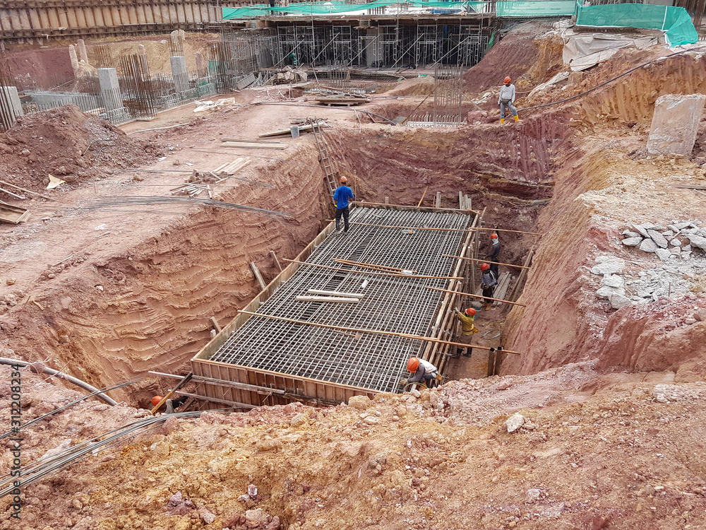 Pile cap and column stump under construction at the construction site ...