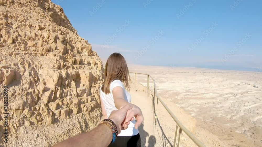 Man follow his woman on the Mount Stock Video | Adobe Stock