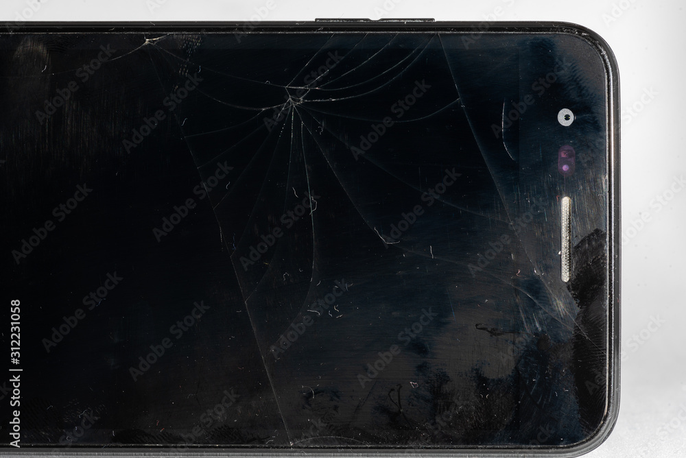 details of a broken screen of a smart phone Stock Photo | Adobe Stock