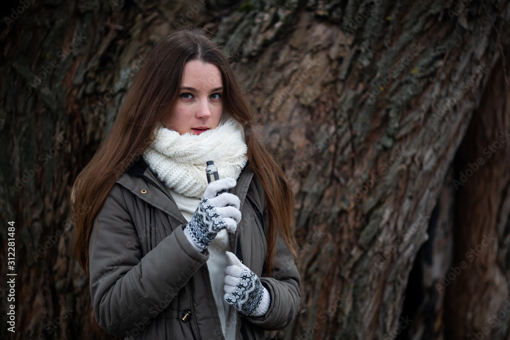 Smoking teenager in real life. Young beautiful white teeage girl in ...
