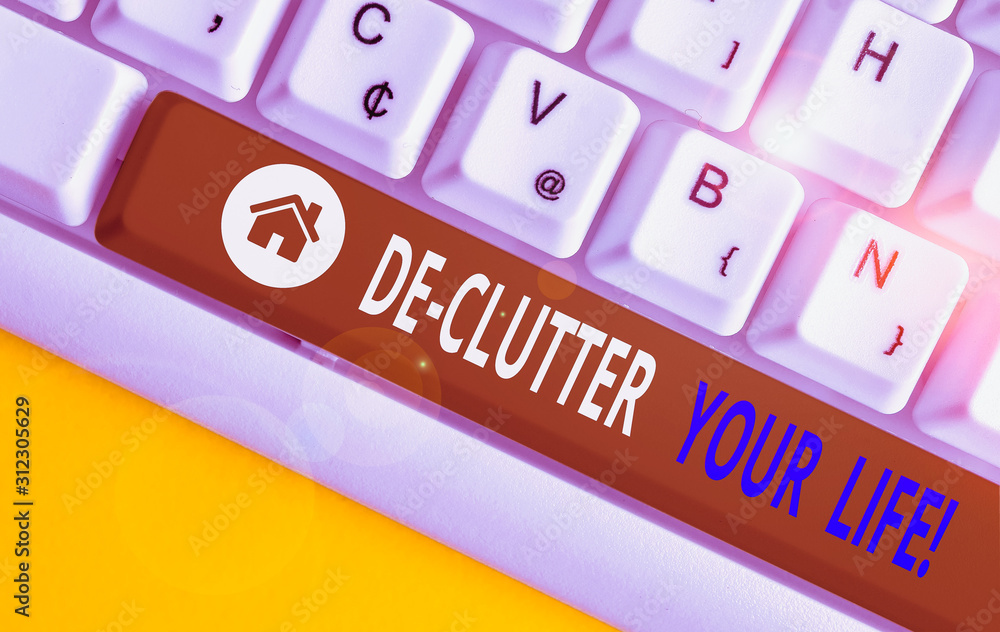 Writing note showing De Clutter Your Life. Business concept for remove ...